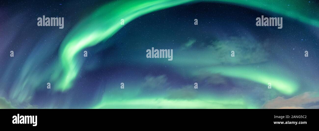 Northern lights or Aurora borealis in the night sky over arctic circle ...
