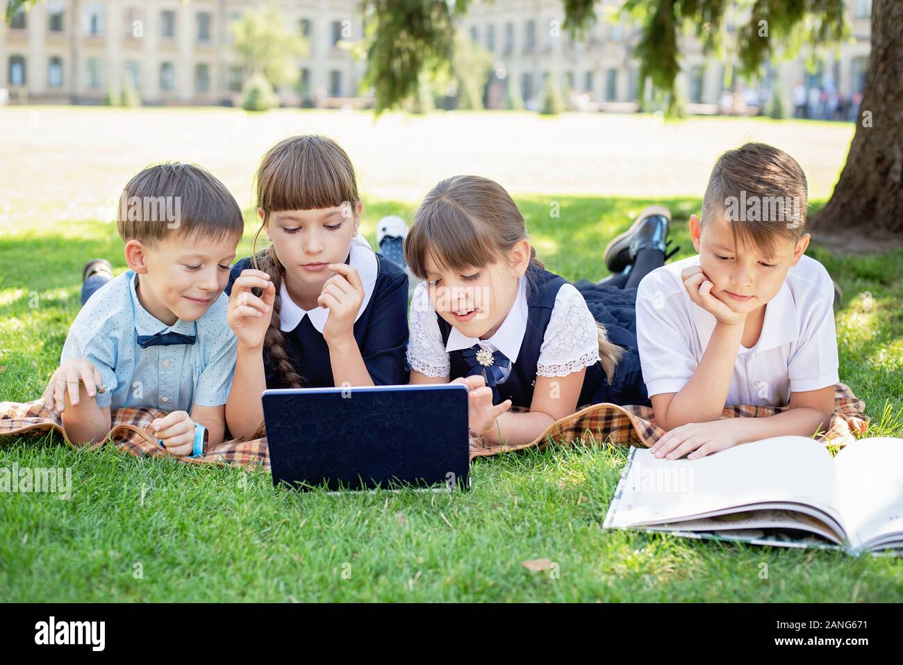 children with laptop computer. Little child using pc. Life online ...