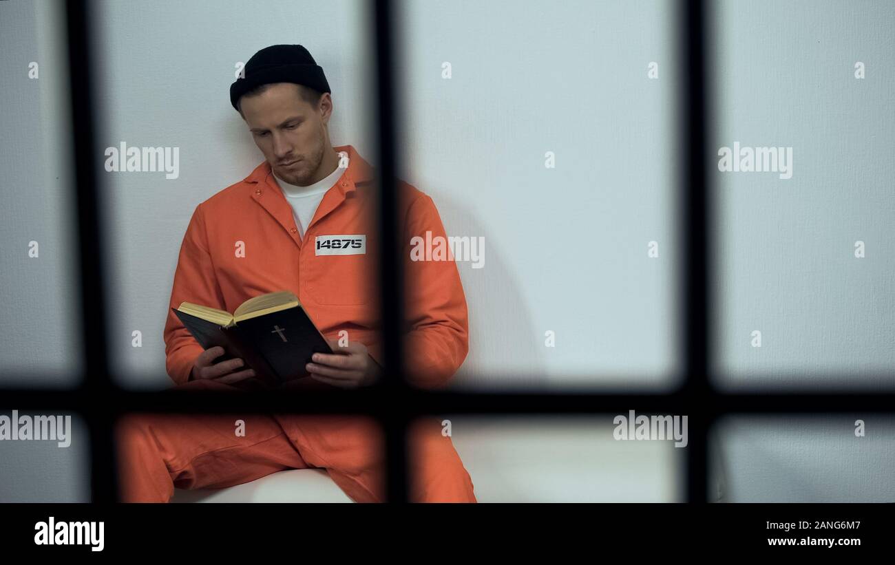Prisoner reading bible hi-res stock photography and images - Alamy