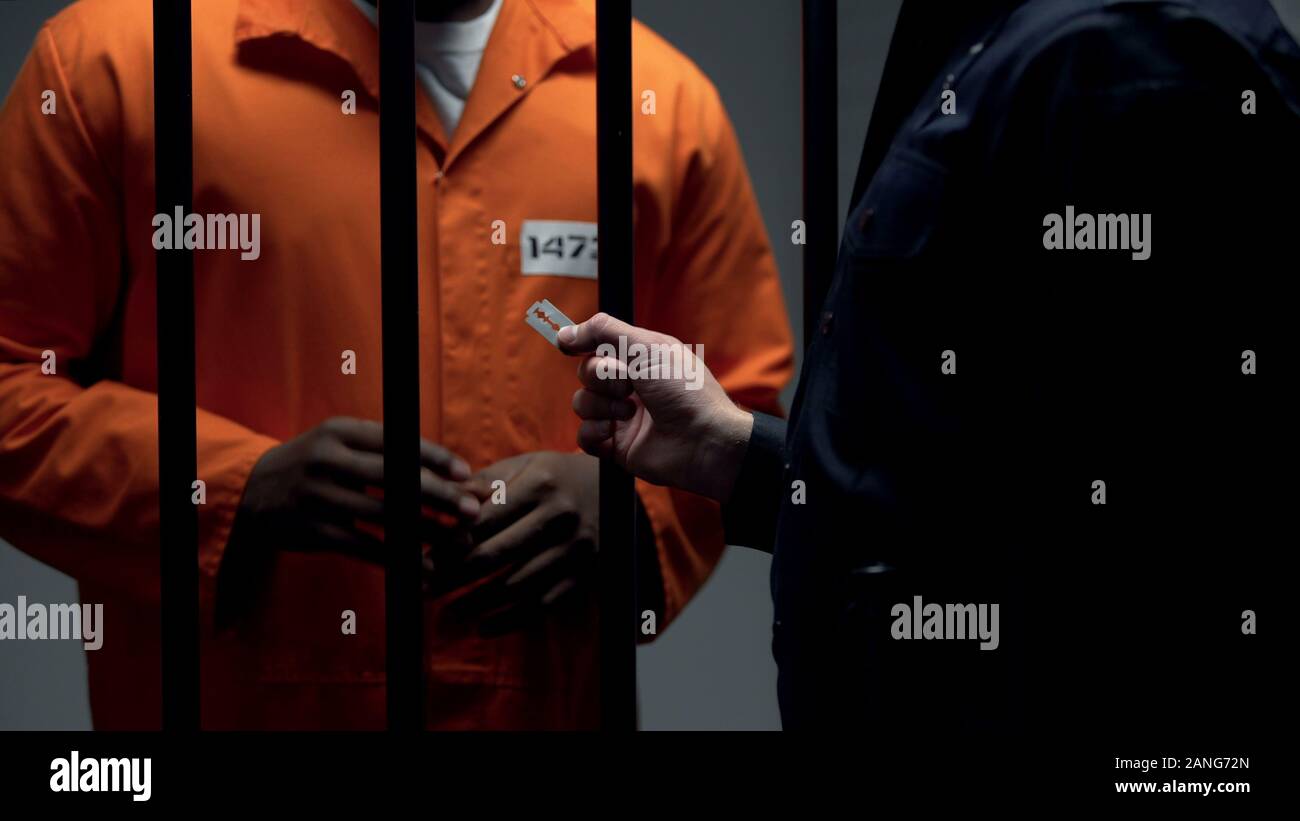 Corrupt officer giving black imprisoned criminal blade, revolt ...