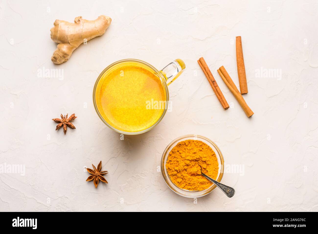 Cup of traditional indian masala chai tea with ingredients above over ...