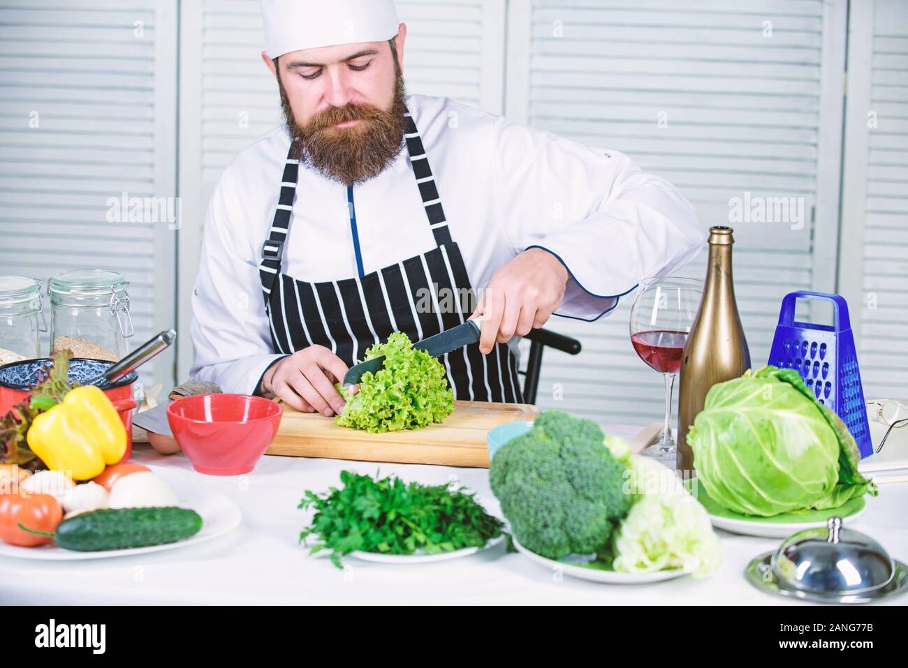 Basic cooking processes. Man master chef or amateur cooking food. Sharp ...