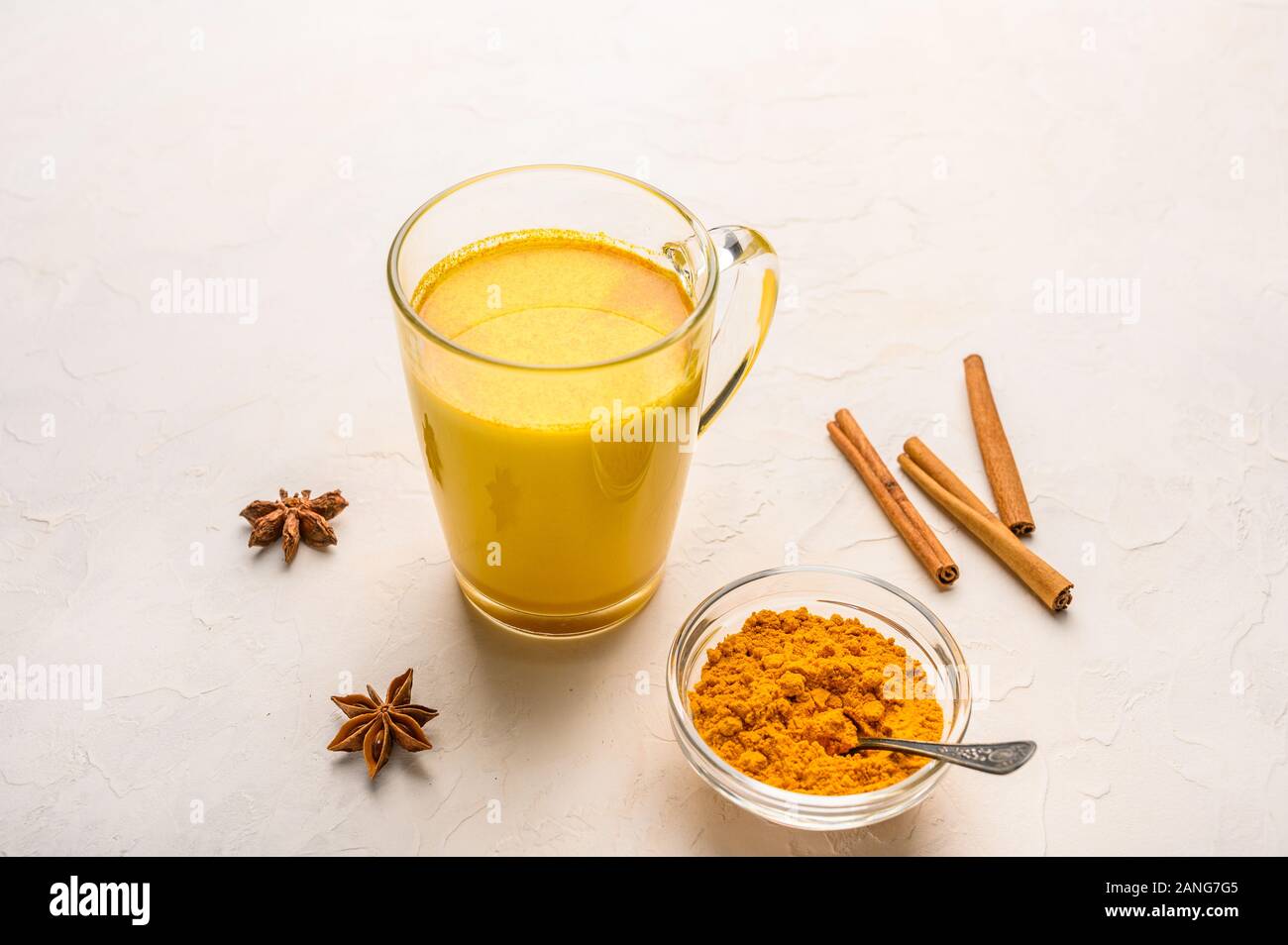 Cup of traditional indian masala chai tea with ingredients above over ...