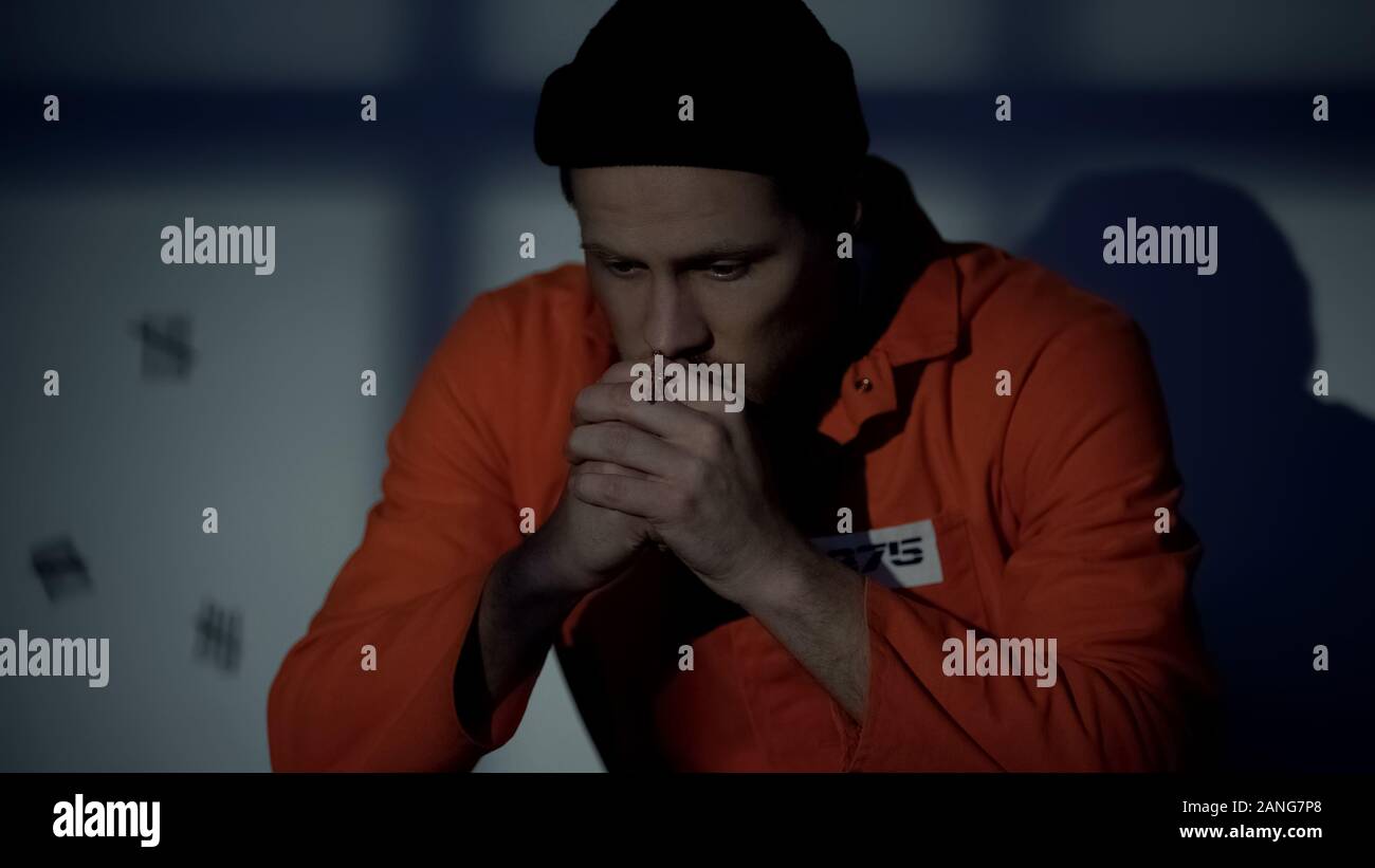 Male prisoner cross hi-res stock photography and images - Alamy