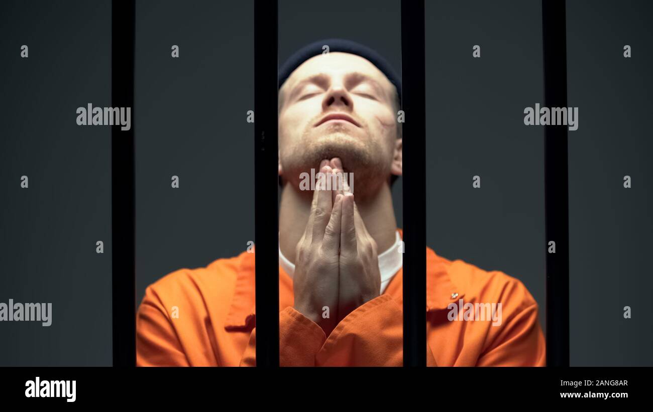 Man in custody cell hi-res stock photography and images - Alamy