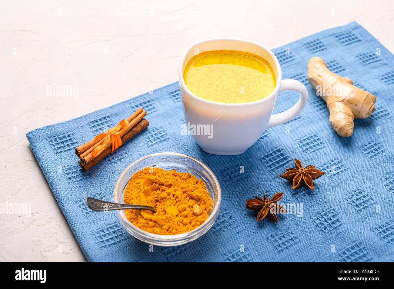 Cup of traditional indian masala chai tea with ingredients above over ...