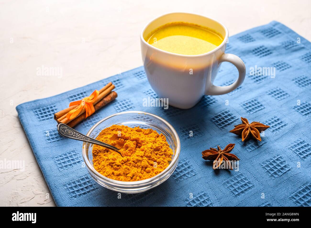Cup of traditional indian masala chai tea with ingredients above over ...