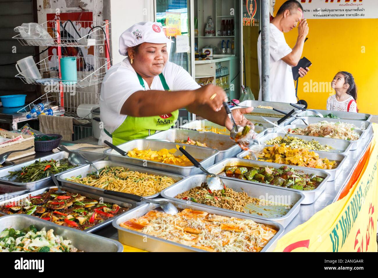 Phuket, Thailand - October 13th 2015: Woman serving food during the ...