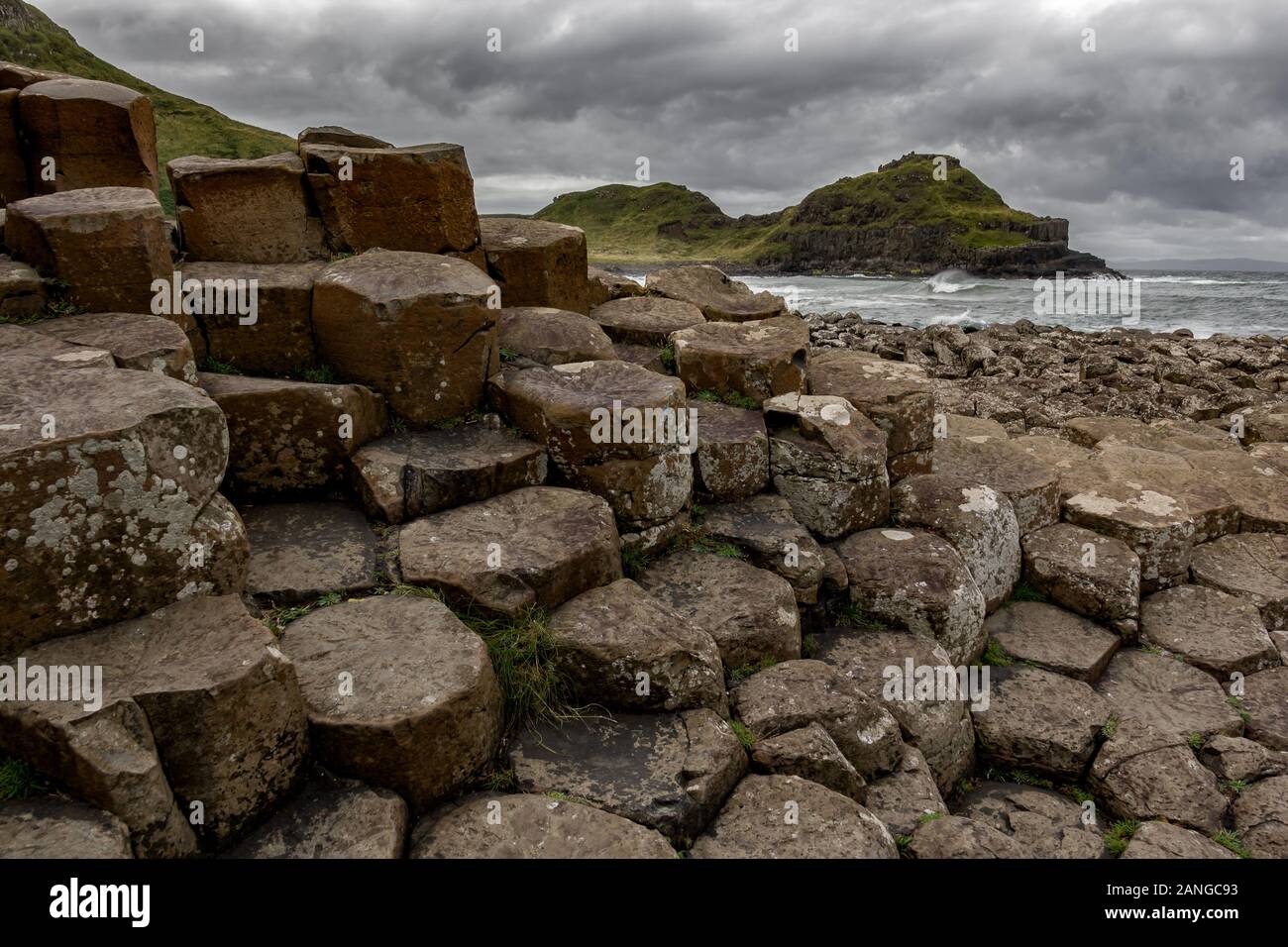 Basalt columns of Giants Causeway in Ireland under dramatic sky Stock ...