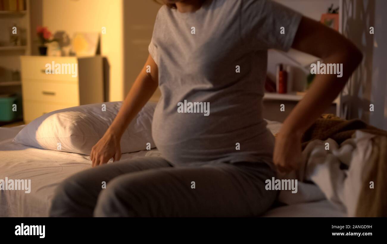 Woman Getting Up From Bed High Resolution Stock Photography and Images ...