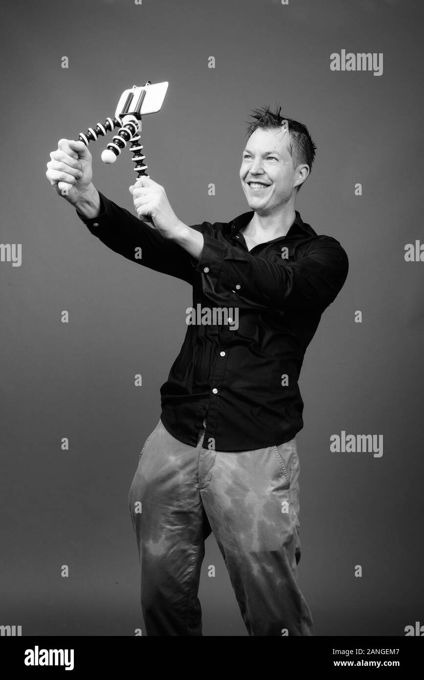 Man wet clothes white background Black and White Stock Photos & Images ...