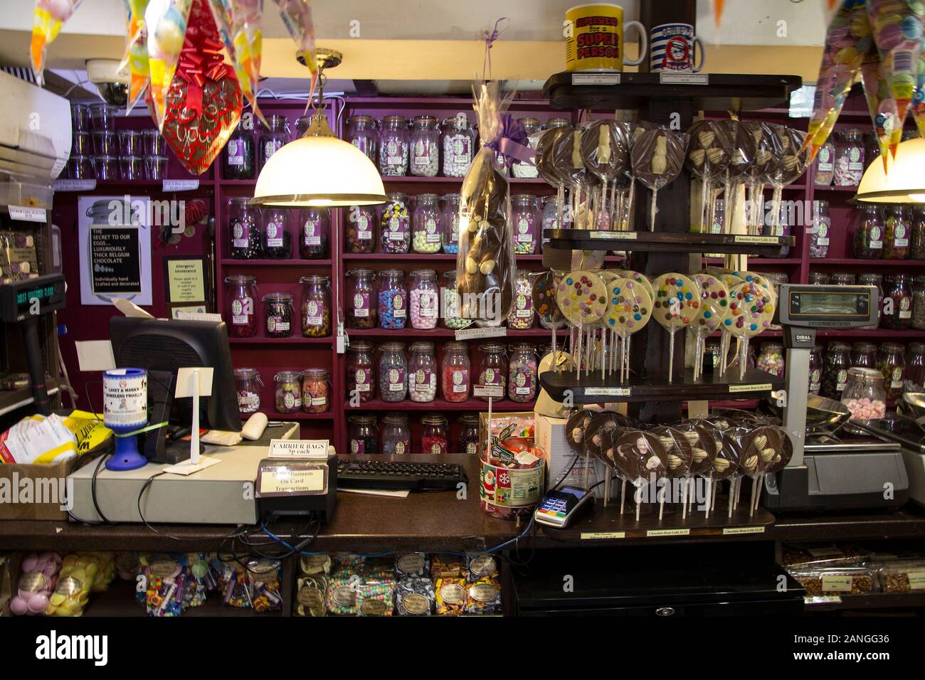 BATH, UK - APRIL 10, 2019. Interior of sweetshop with bottle and jars ...