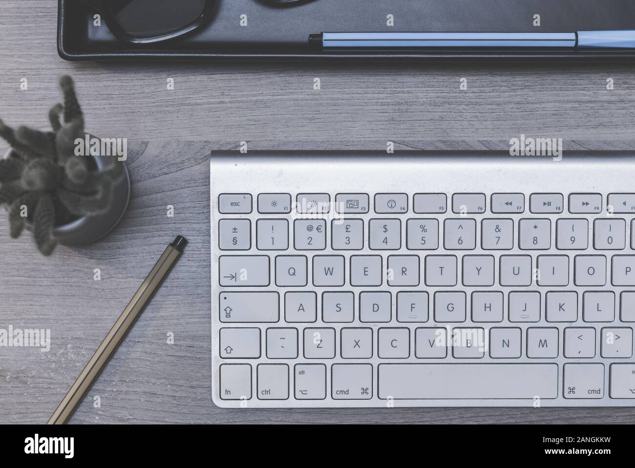 Modern office desk overhead in home office with computer keyboard and ...