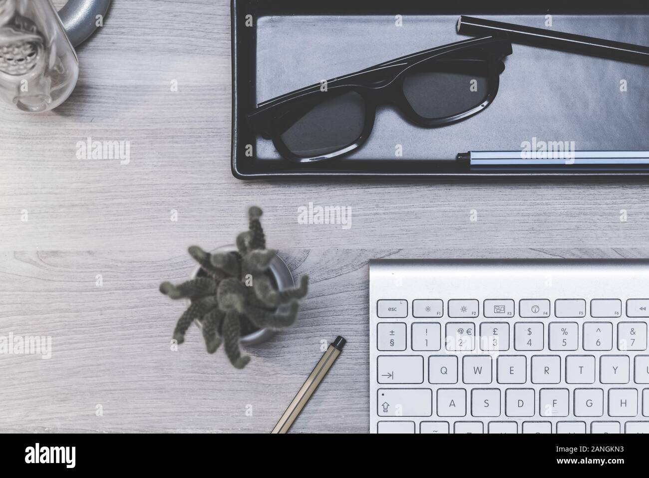 Modern office desk overhead in home office with computer keyboard and ...