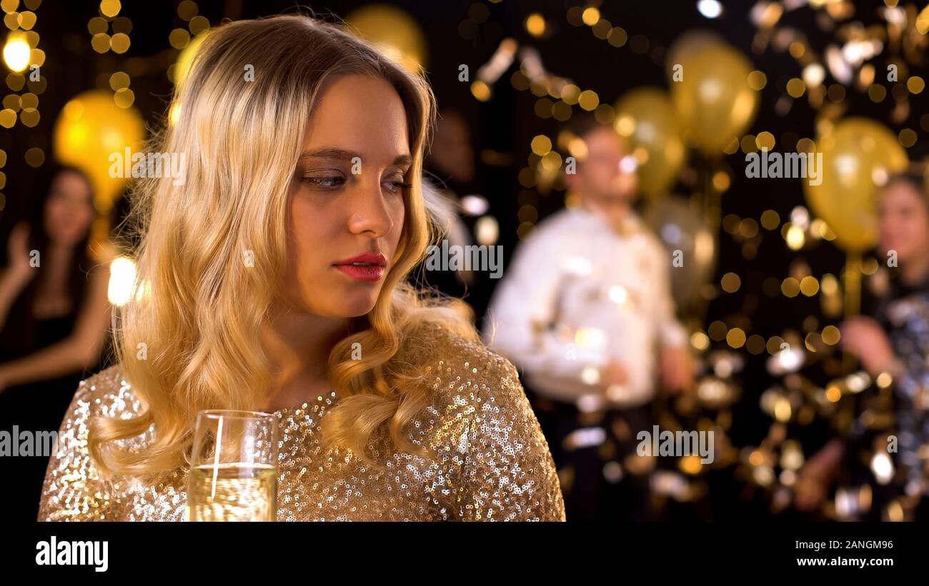 Person standing alone party hi-res stock photography and images - Alamy