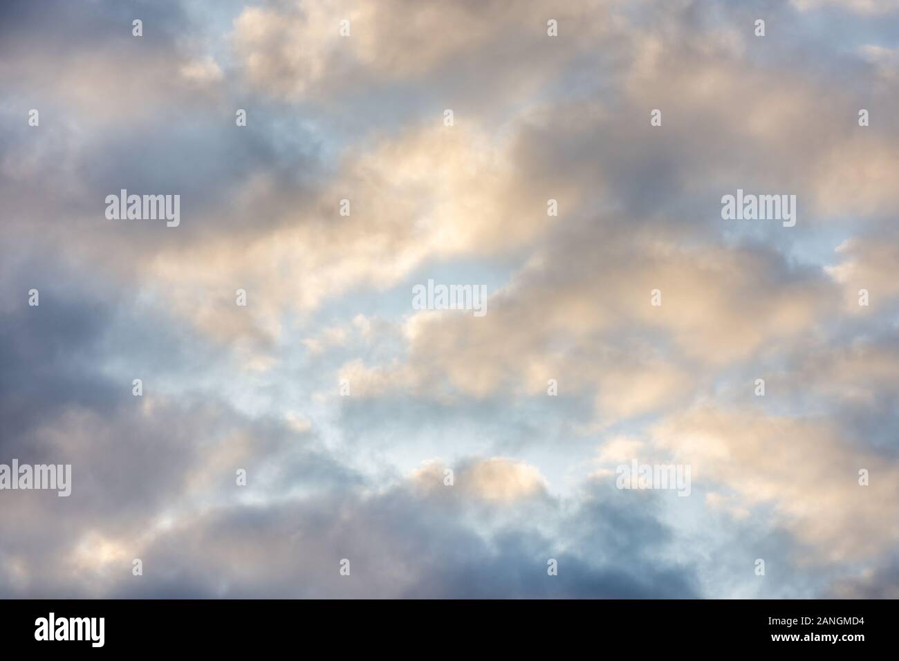 texture bright contrast sky with clouds and sun rays Stock Photo - Alamy