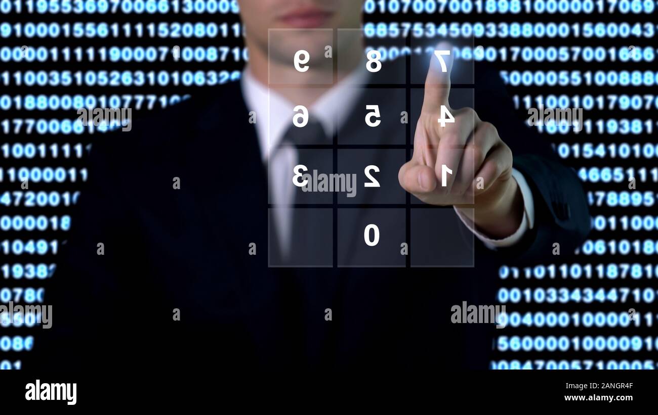 Man entering password on screen, security data base access, modern ...