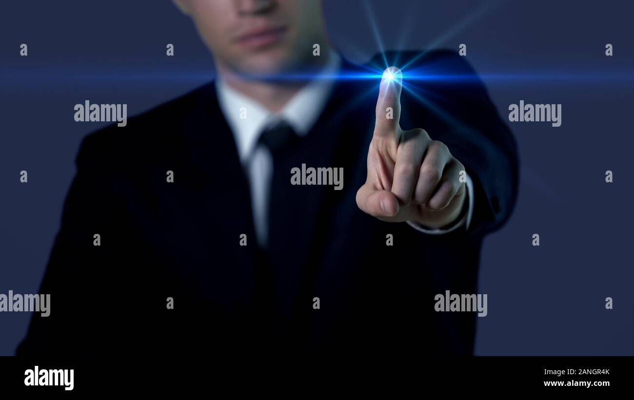 Man in suit touching screen, fingerprint access, modern technologies ...