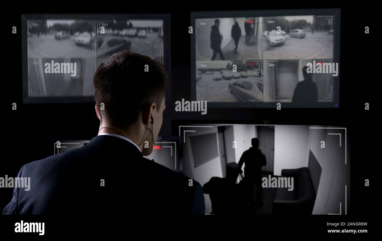 Security guard watching cctv footage hi-res stock photography and ...
