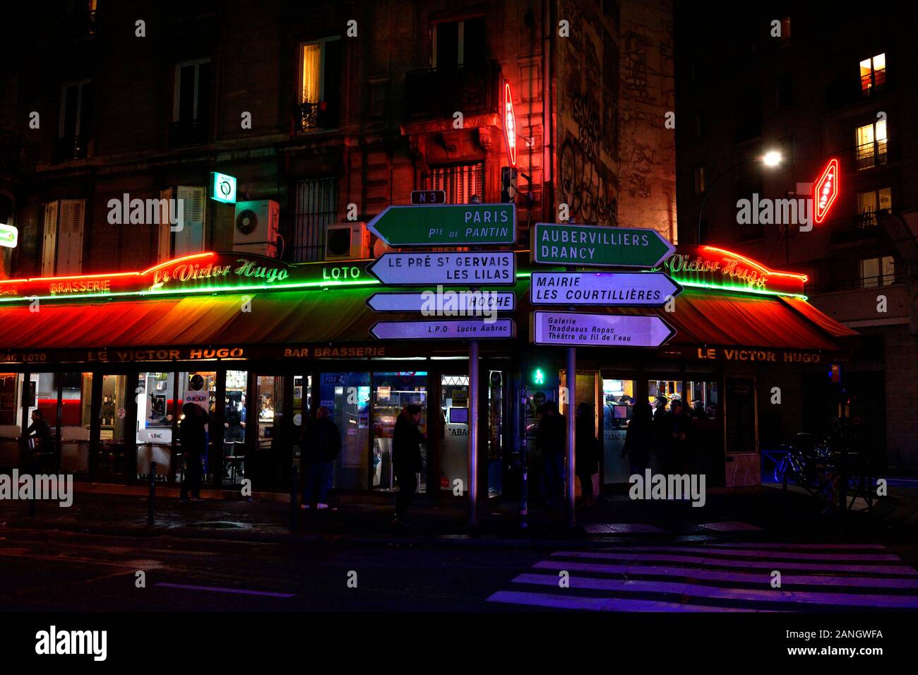 PARIS TRADITIONAL BAR-TOBACCONIST PLACE WITH SIGNS ROAD AT NIGHT TIME ...