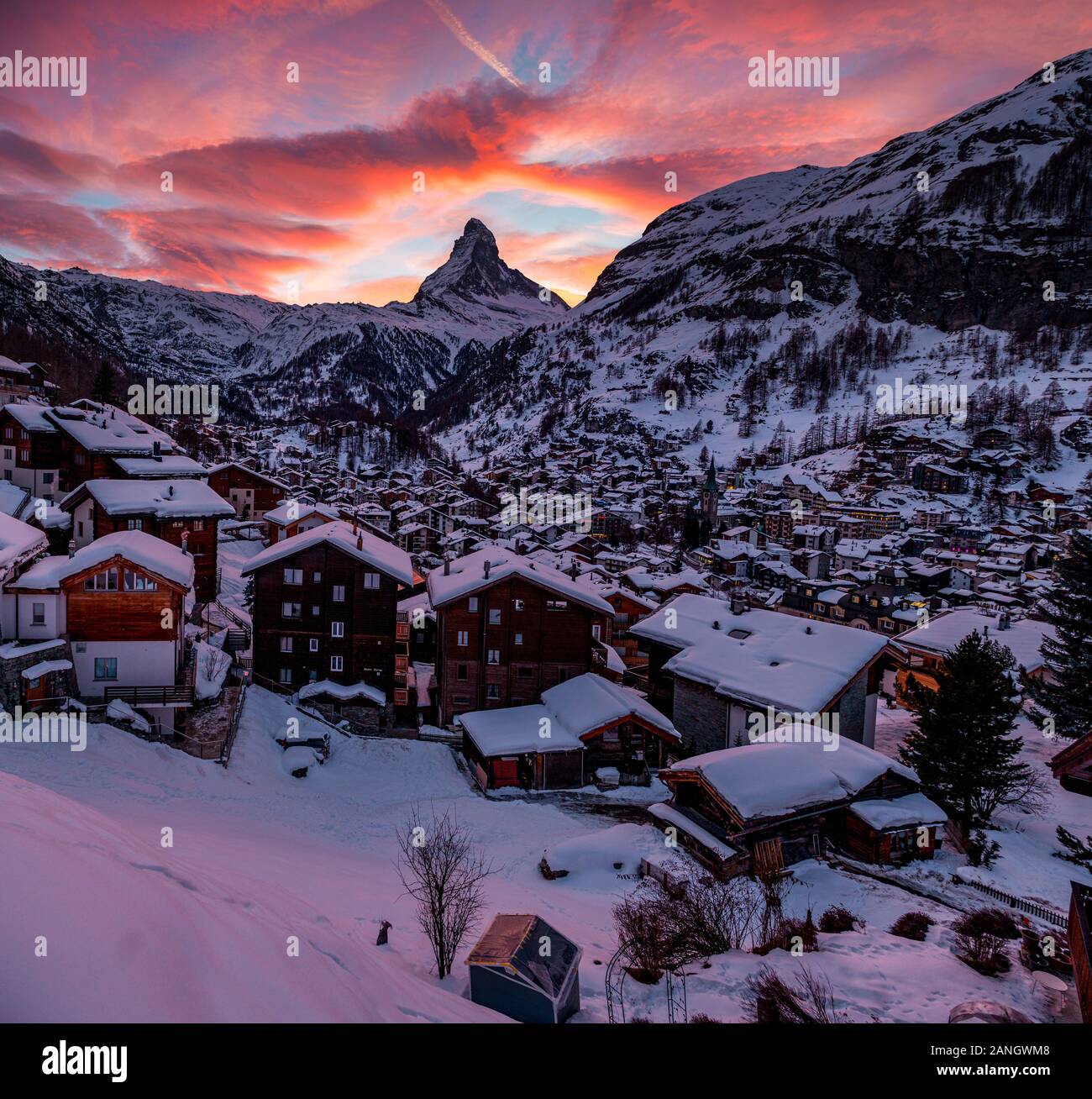 the alpine village of Zermatt and Matterhorn at a wonderful sunset in ...