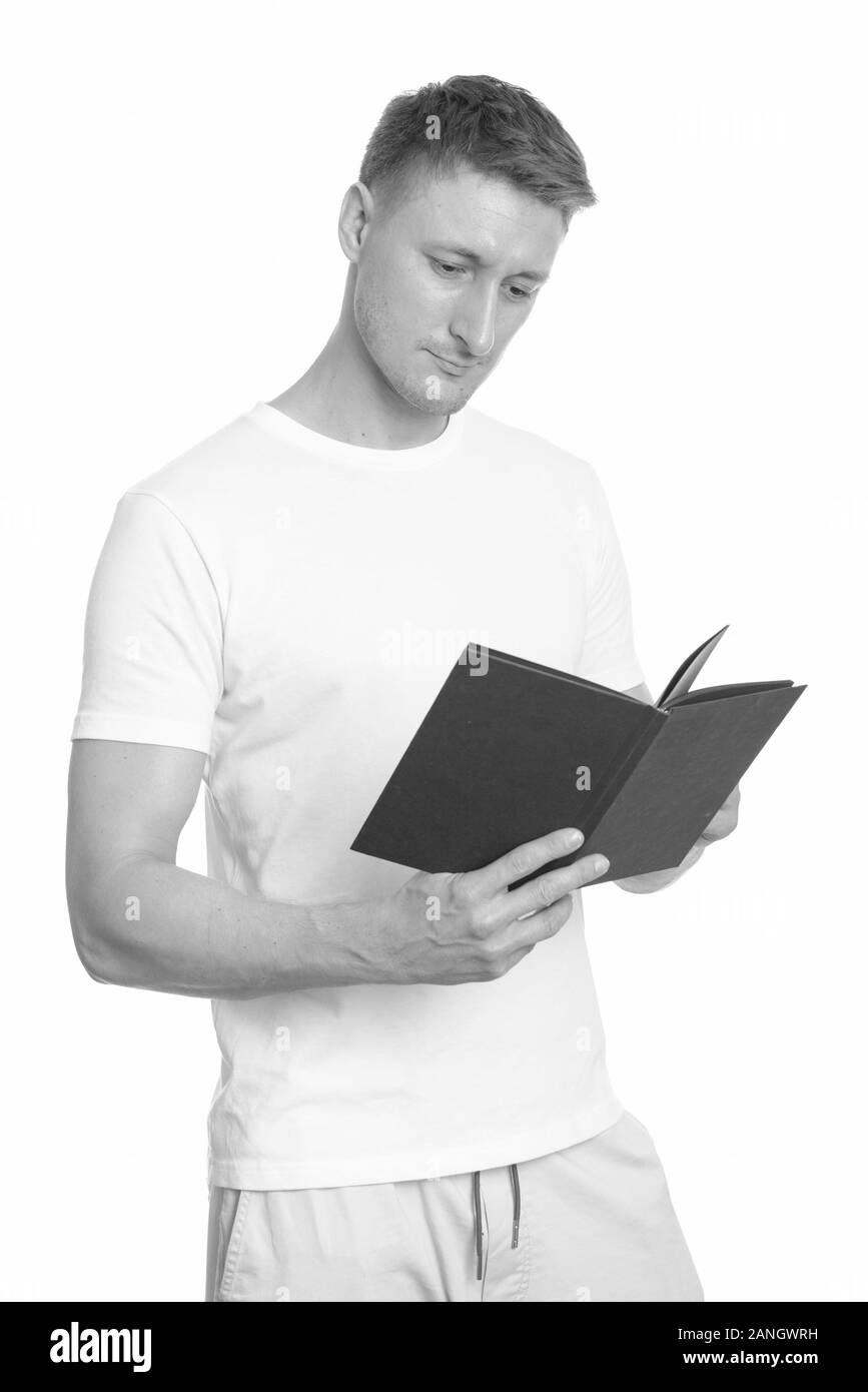 Adult reading book Black and White Stock Photos & Images - Alamy