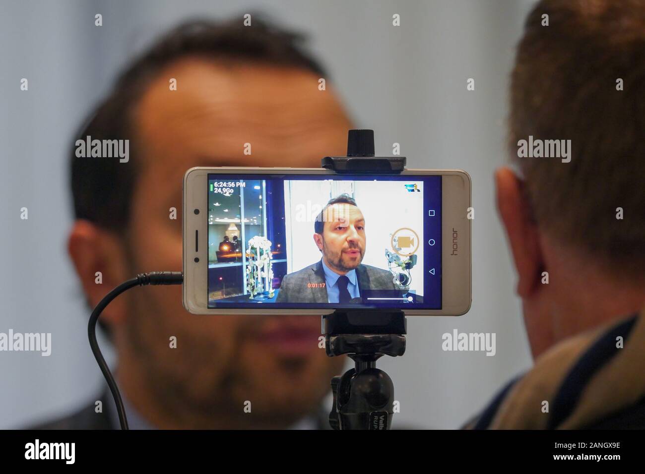 French far right deputy Sebastien Chenu talks to TV journalist, Vaulx ...