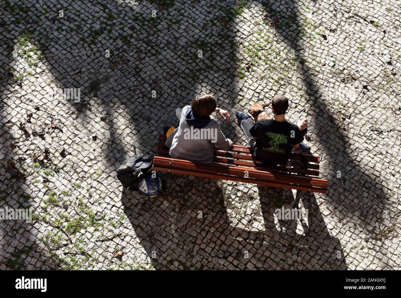 Two people sitting down outside hi-res stock photography and images - Alamy