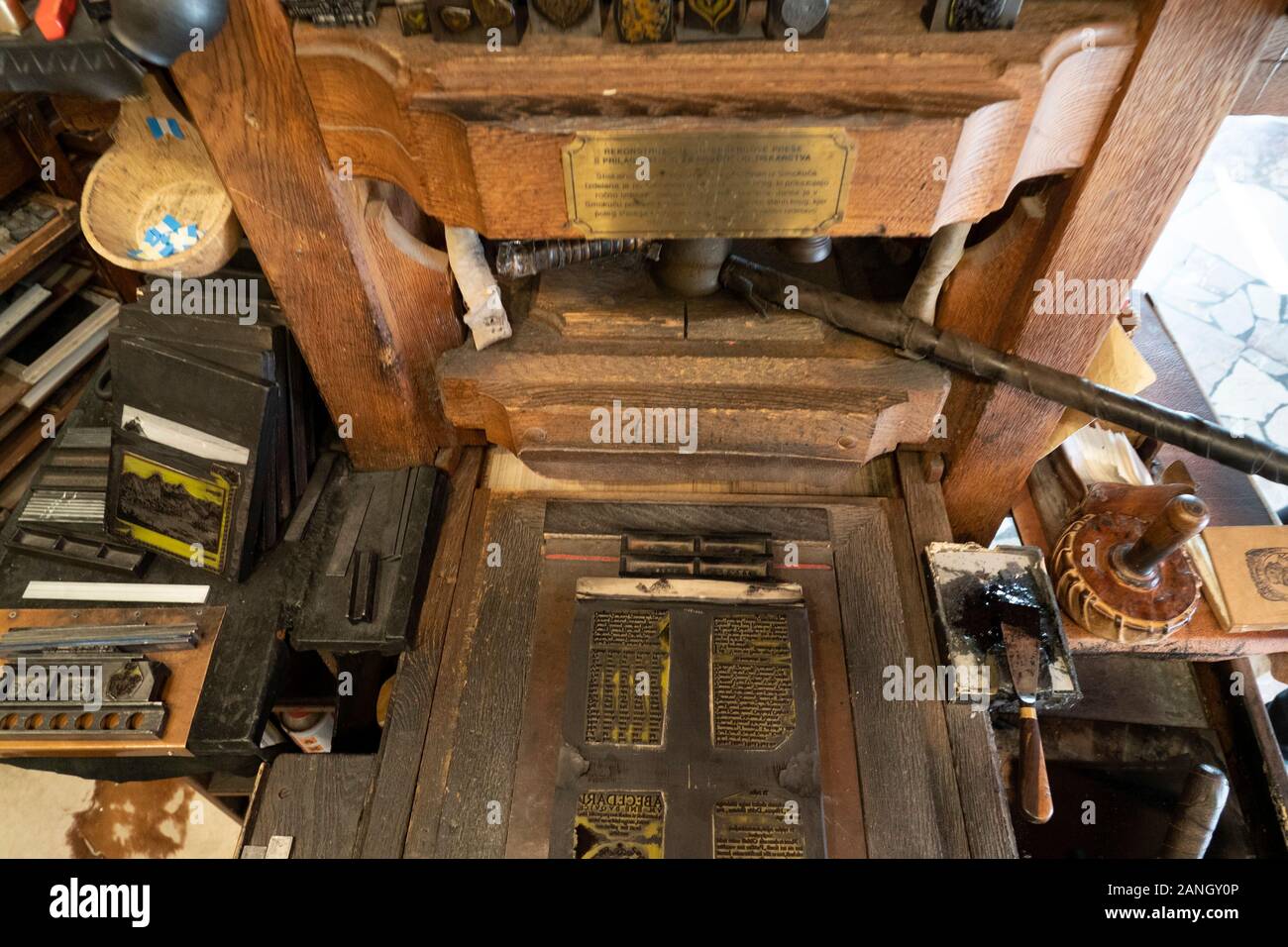 Old ancient print machine hand press detail Stock Photo - Alamy