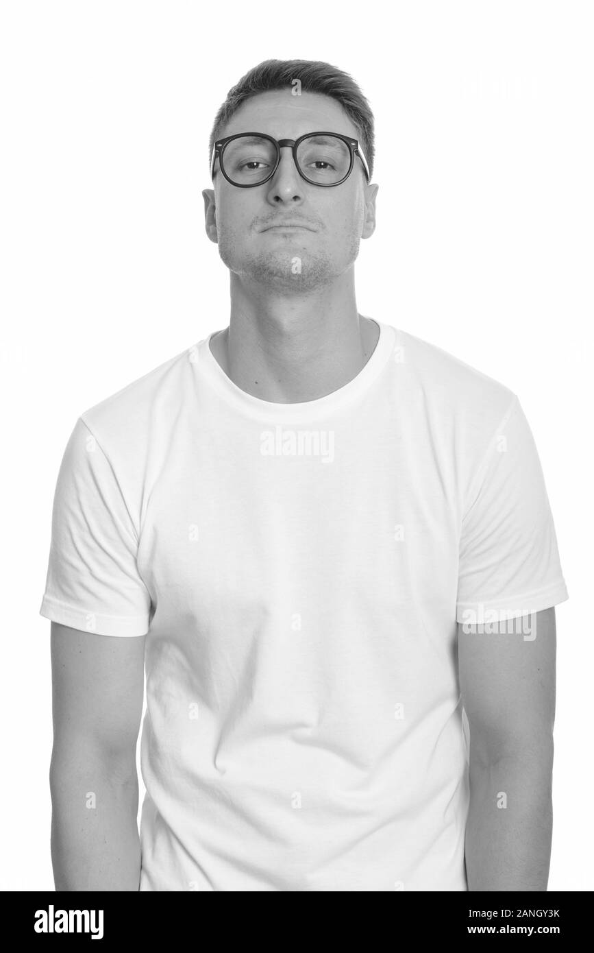 Portrait of stressed young nerd man looking bored and tired Stock Photo ...