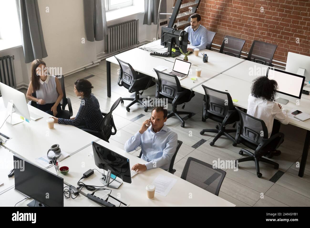 Diverse colleagues collaborating on hi-res stock photography and images ...