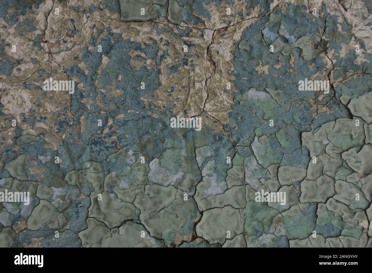 Bumpy layers of damaged blue greenish paint peeling .Old weathered ...