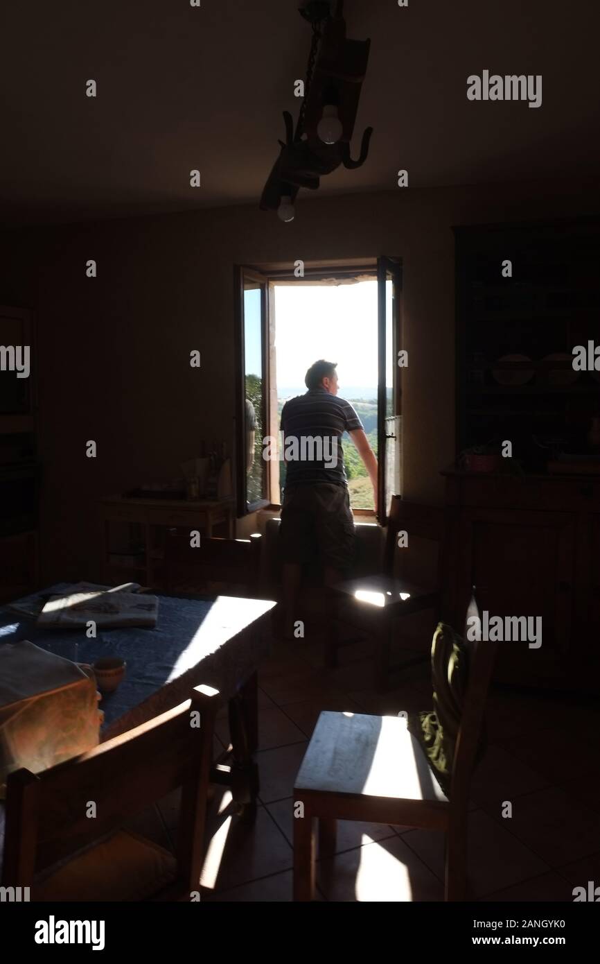 Man looking out window silhouette hi-res stock photography and images ...
