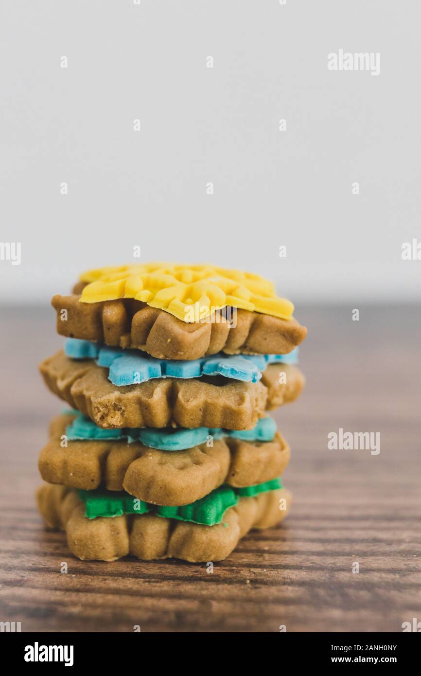 festive gingerbread cookies in different colors and shapes, a ...