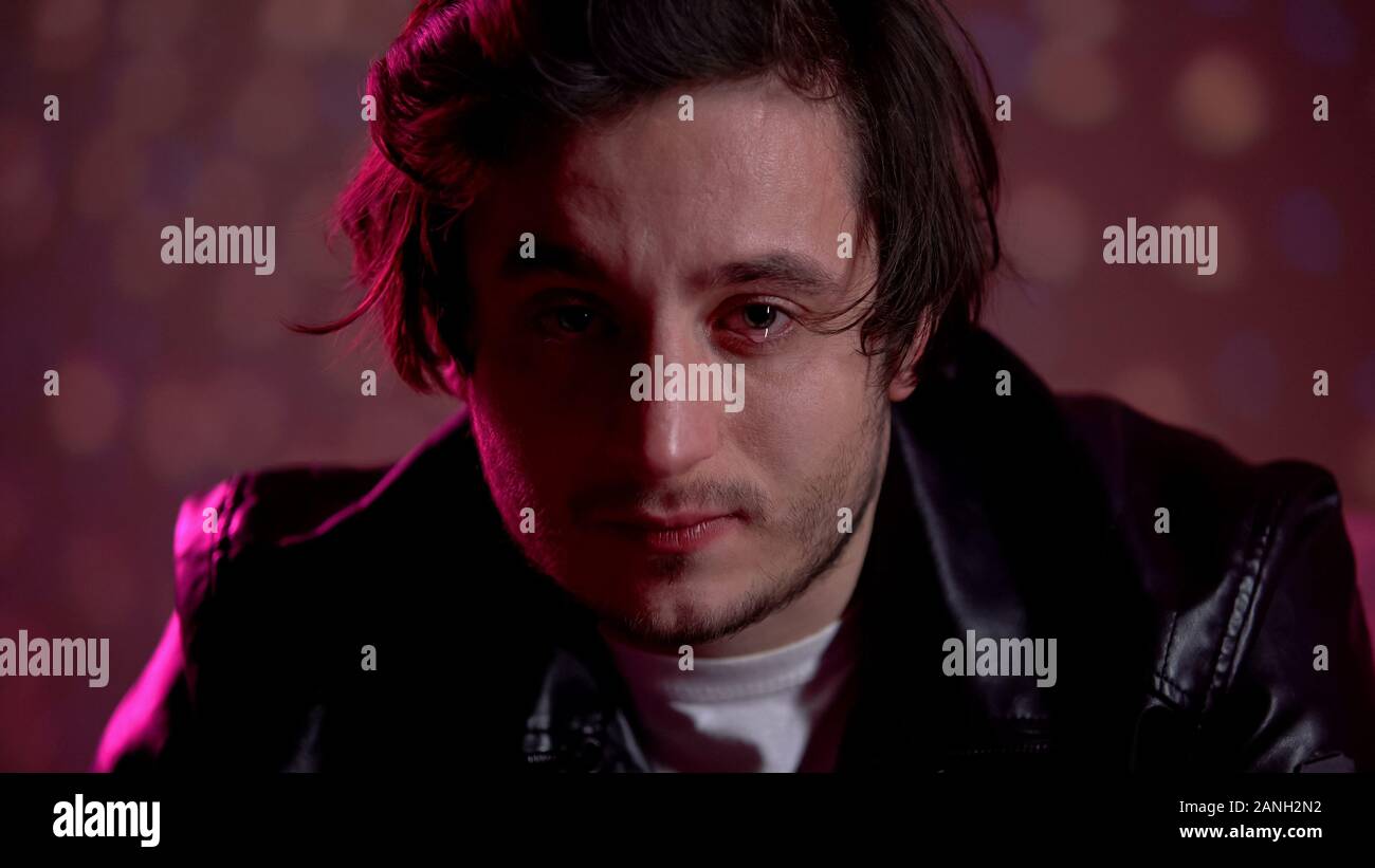 Frustrated man looking at camera and crying lost hope and sense of life ...