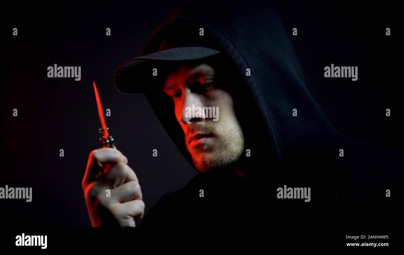 Angry man holding knife hi-res stock photography and images - Alamy