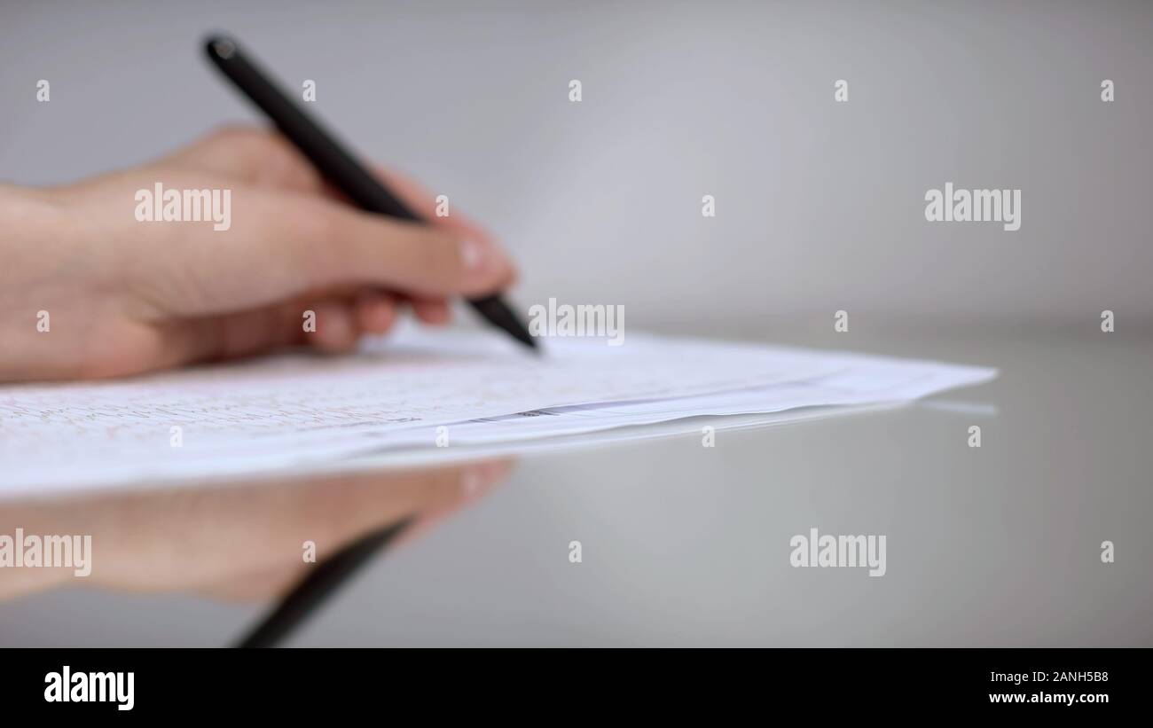 Left-handed doctor cardiologist decoding cardiogram, making ...