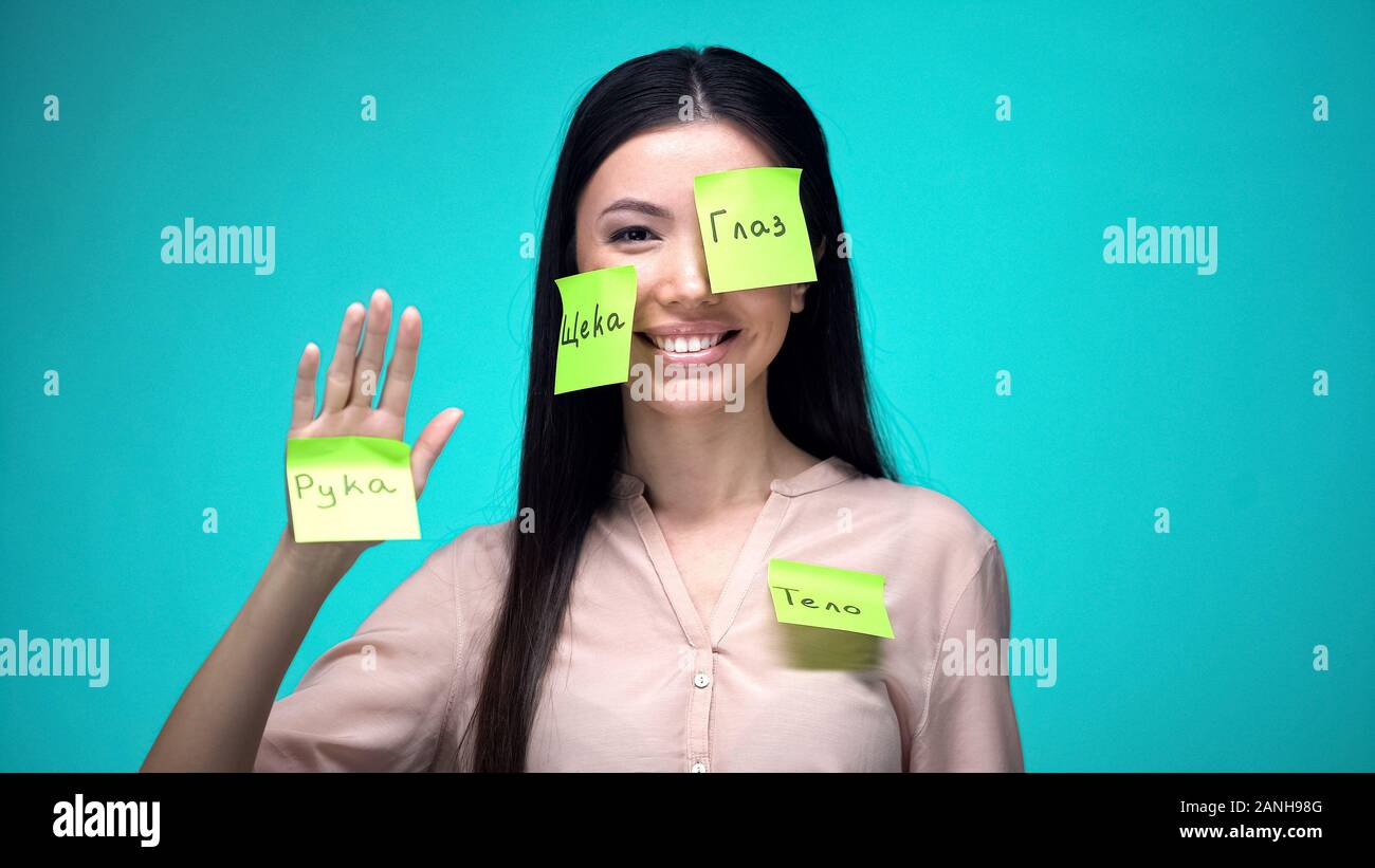 Student learning language, covered with Russian eye cheek hand body ...