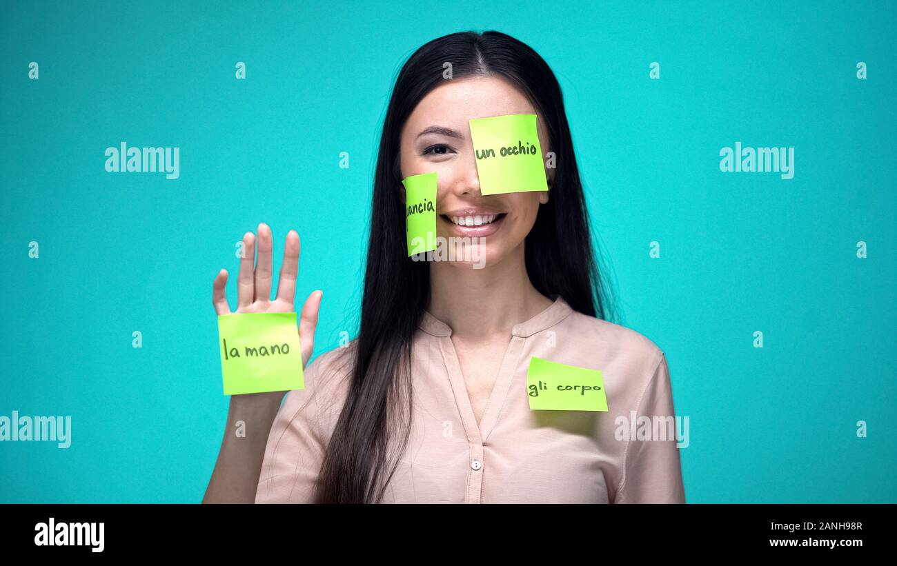 Student learning language, covered with Italian eye cheek hand body ...