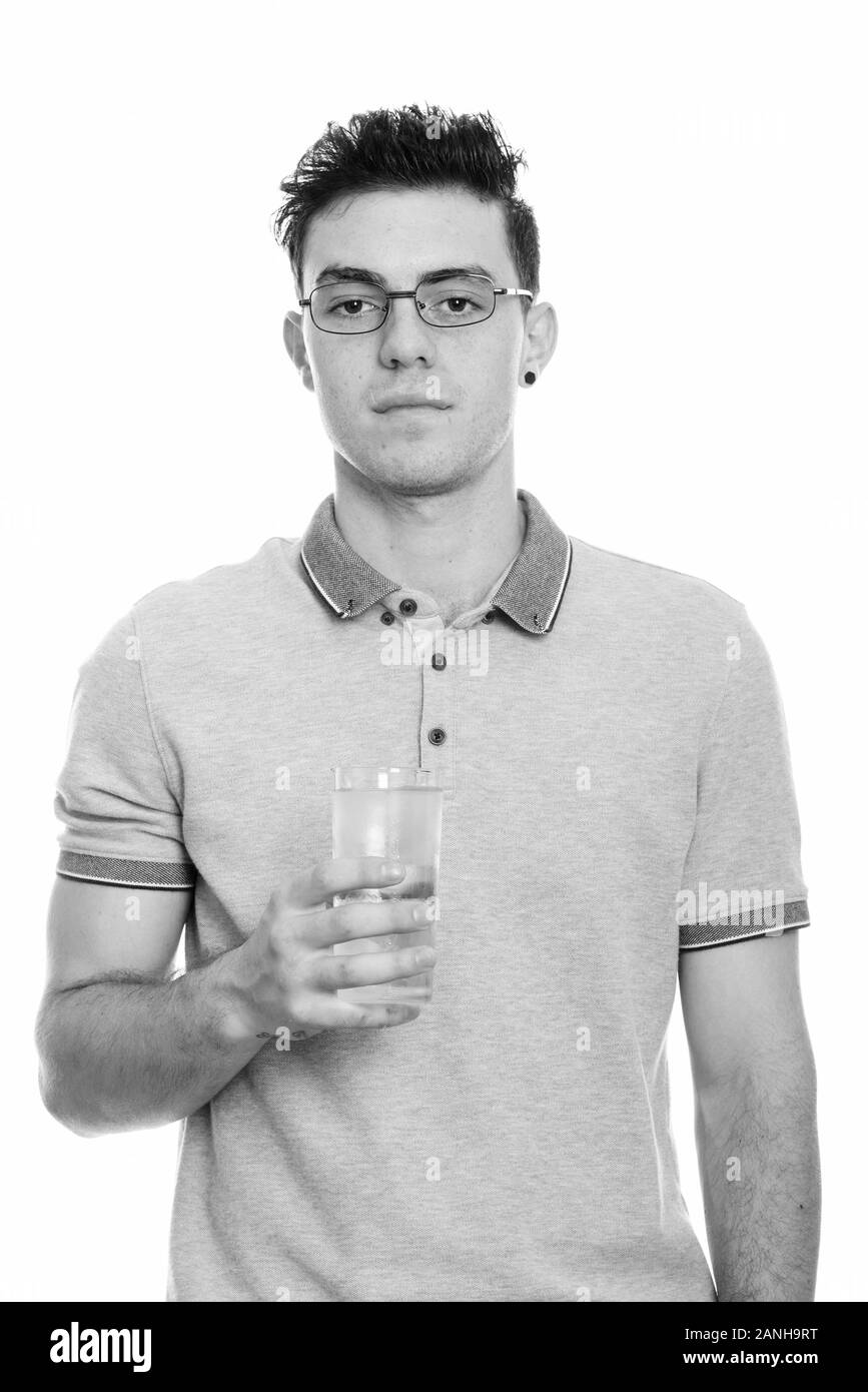 Young man glass water Black and White Stock Photos & Images - Alamy