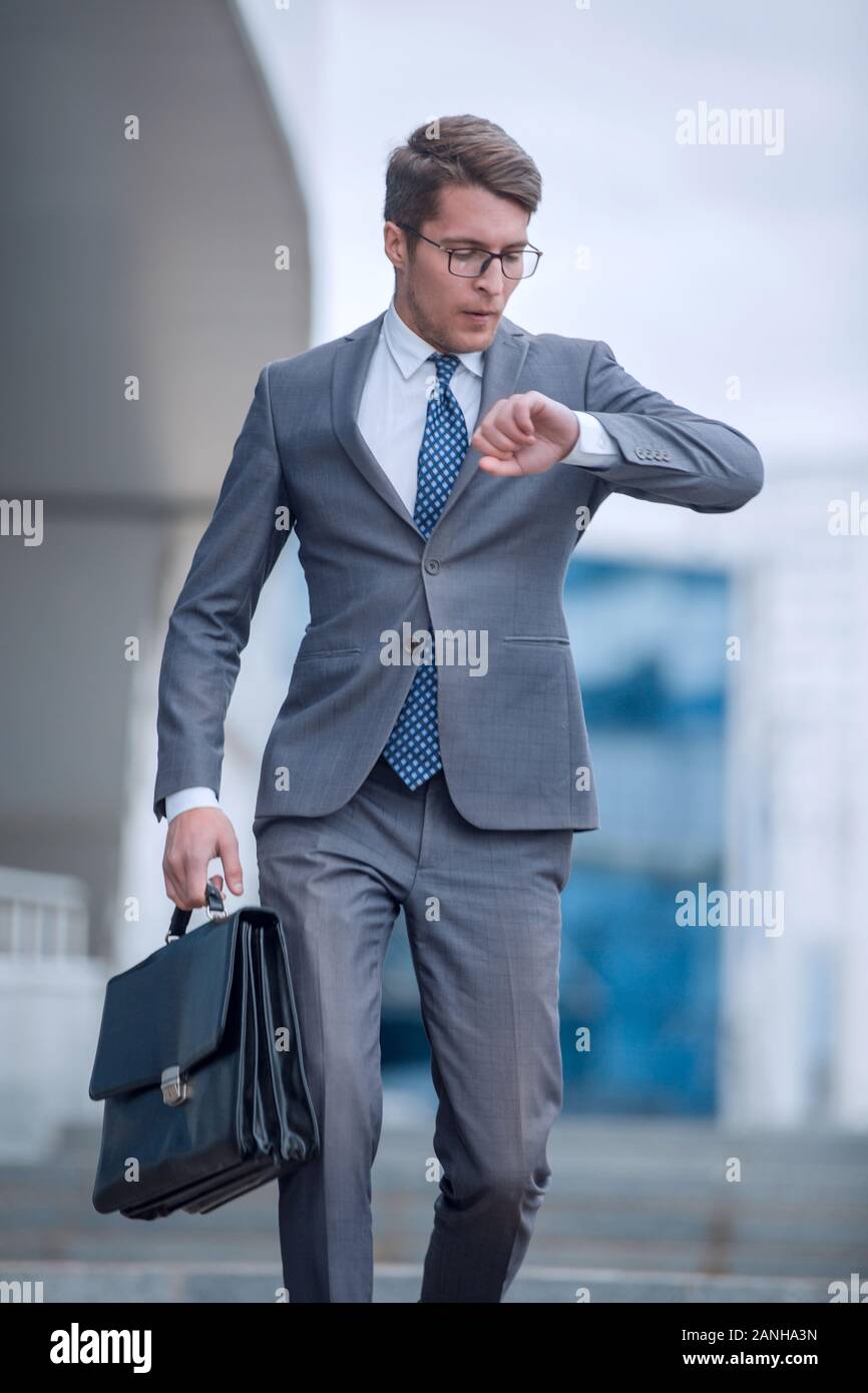 business man somewhere in a hurry on a city street Stock Photo - Alamy