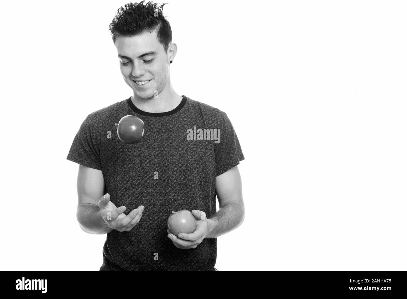 Throwing an apple hi-res stock photography and images - Alamy