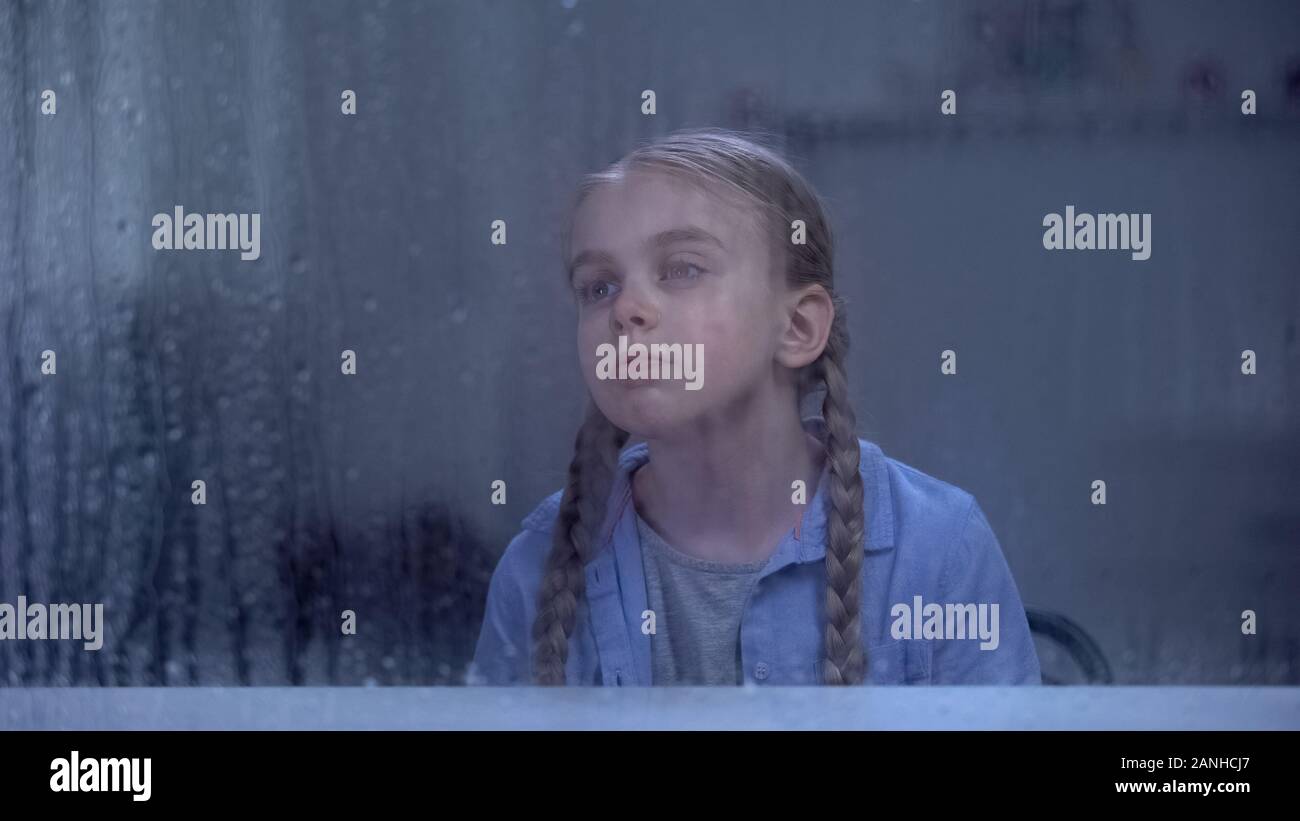 Sad refugee girl closeup hi-res stock photography and images - Alamy