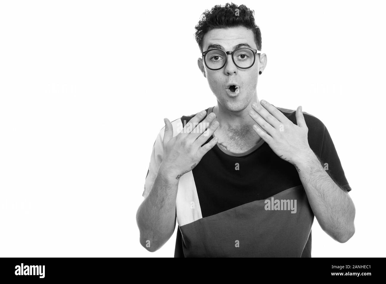 Handsome shocked man in Black and White Stock Photos & Images - Alamy