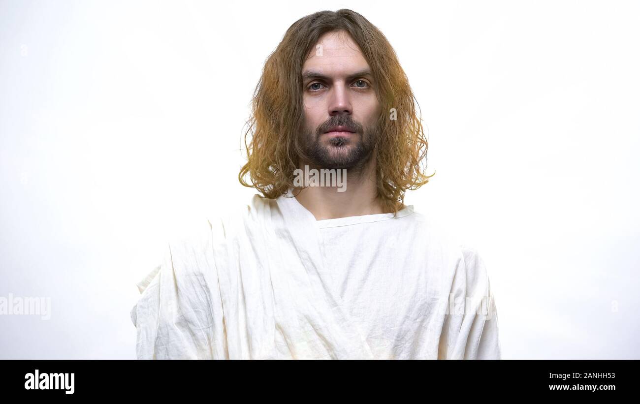 Jesus in light looking on camera, concept of God mercy and forgiveness ...