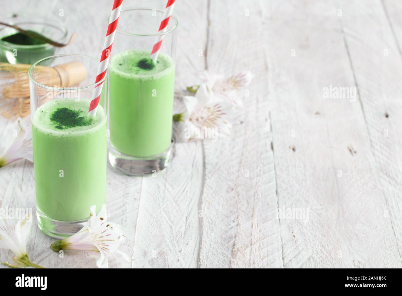 Green matcha milk in a tall glass Stock Photo - Alamy