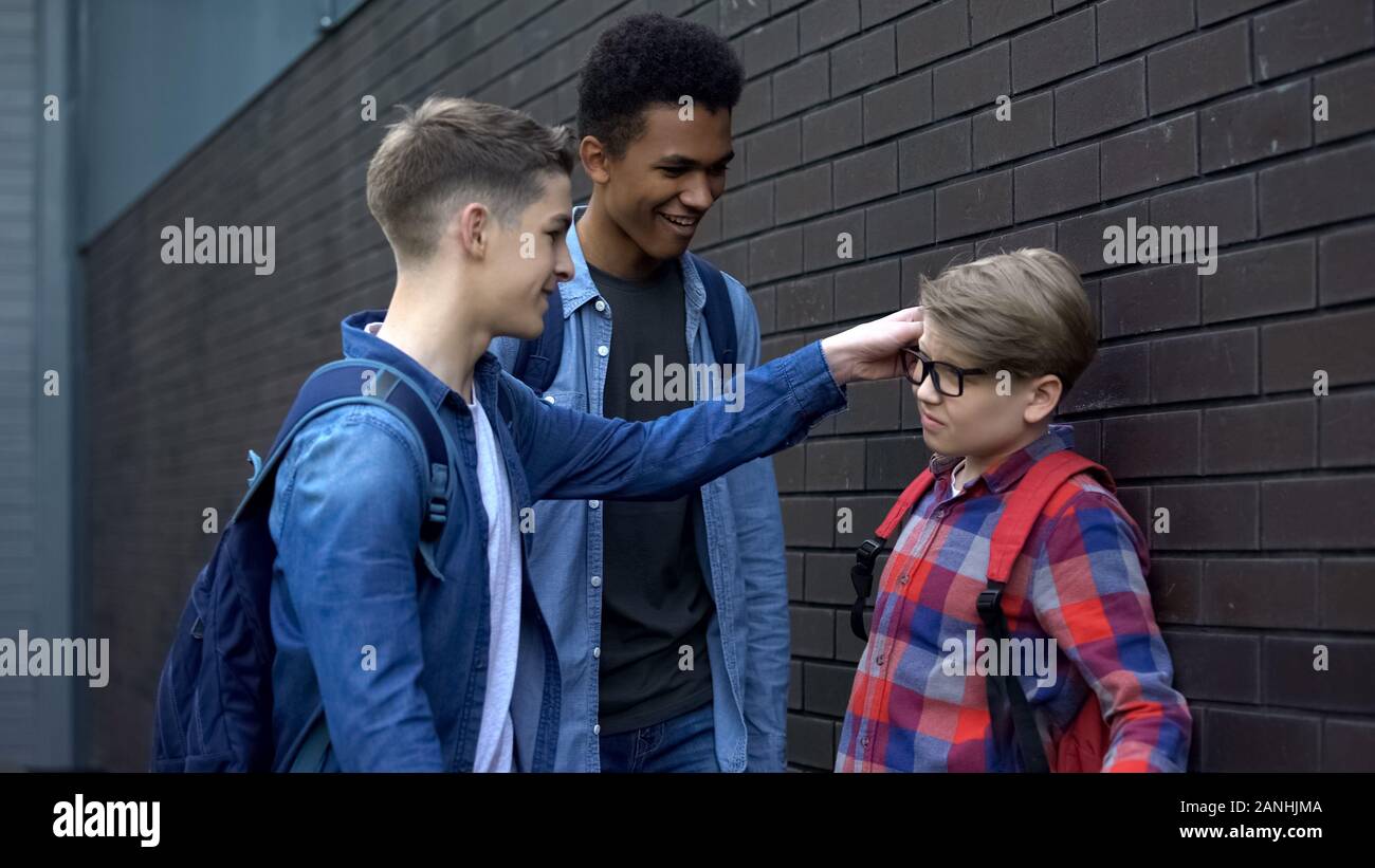 School boys bullied hi-res stock photography and images - Alamy