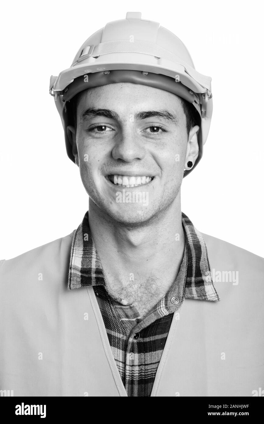 Face of happy young man construction worker smiling Stock Photo - Alamy