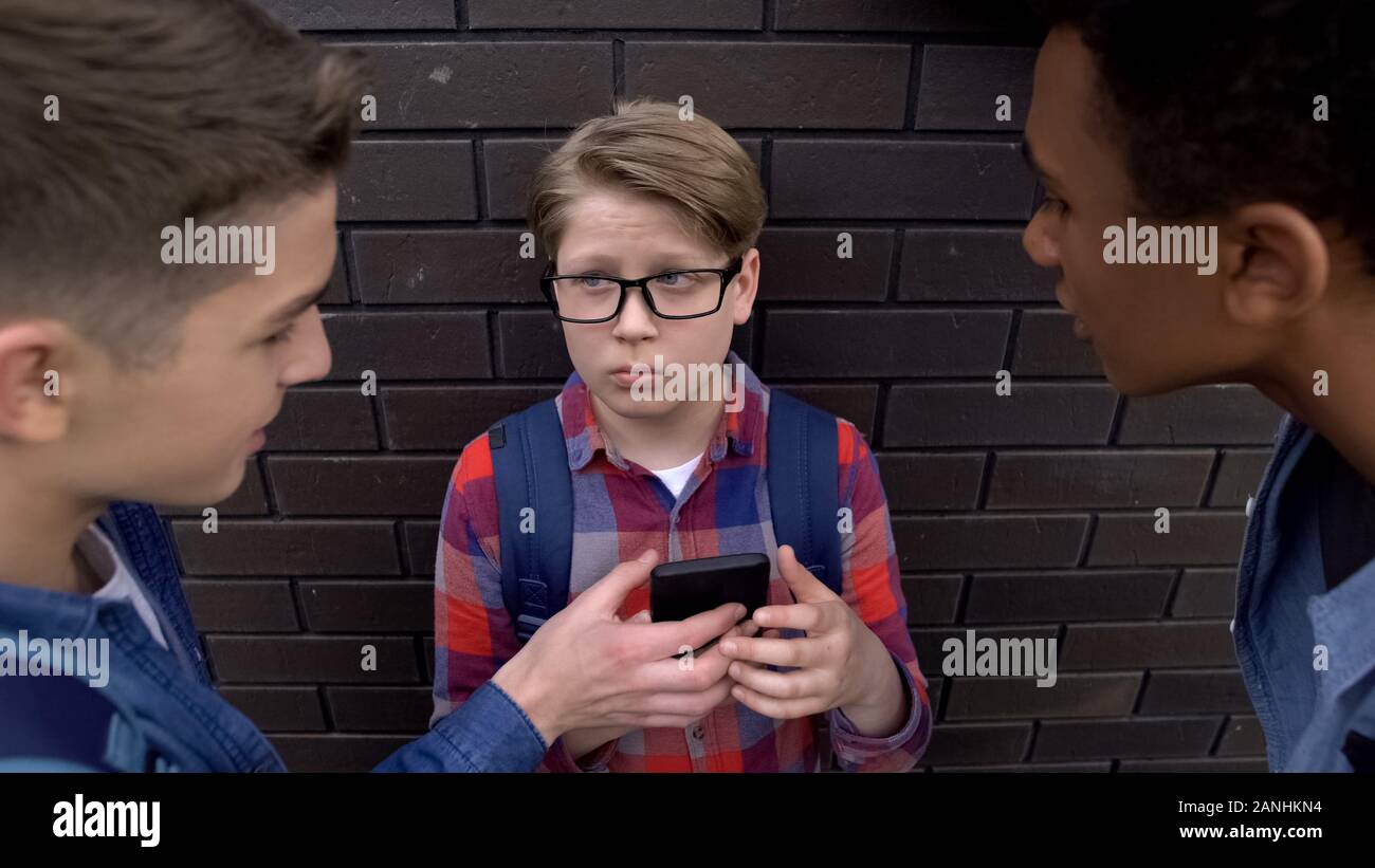 Mean schoolboys taking away phone from classmate, mental pressure ...