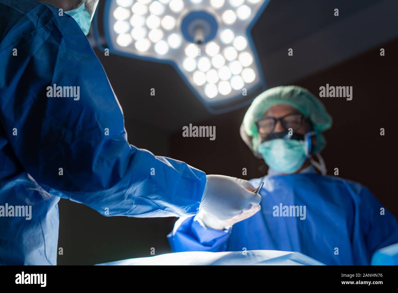 Doctor surgery team in the operating room of abdominal cesarean section ...